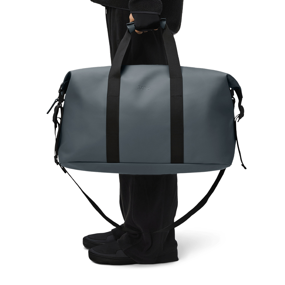 Buy the Lagoon Hilo Weekend Bag by RAINS | Free UK Delivery